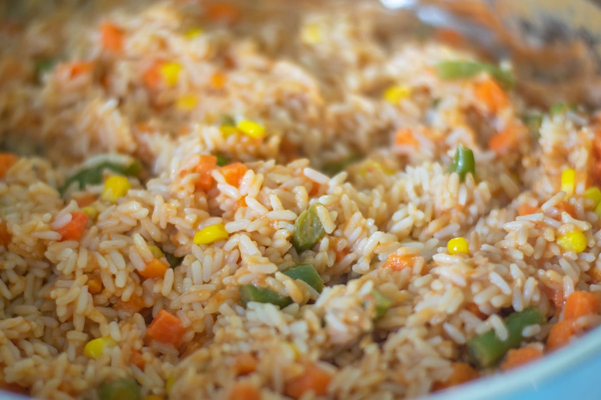 Arroz Rojo Recipe (Mexican Red Rice with Veggies) - Thrift and Spice